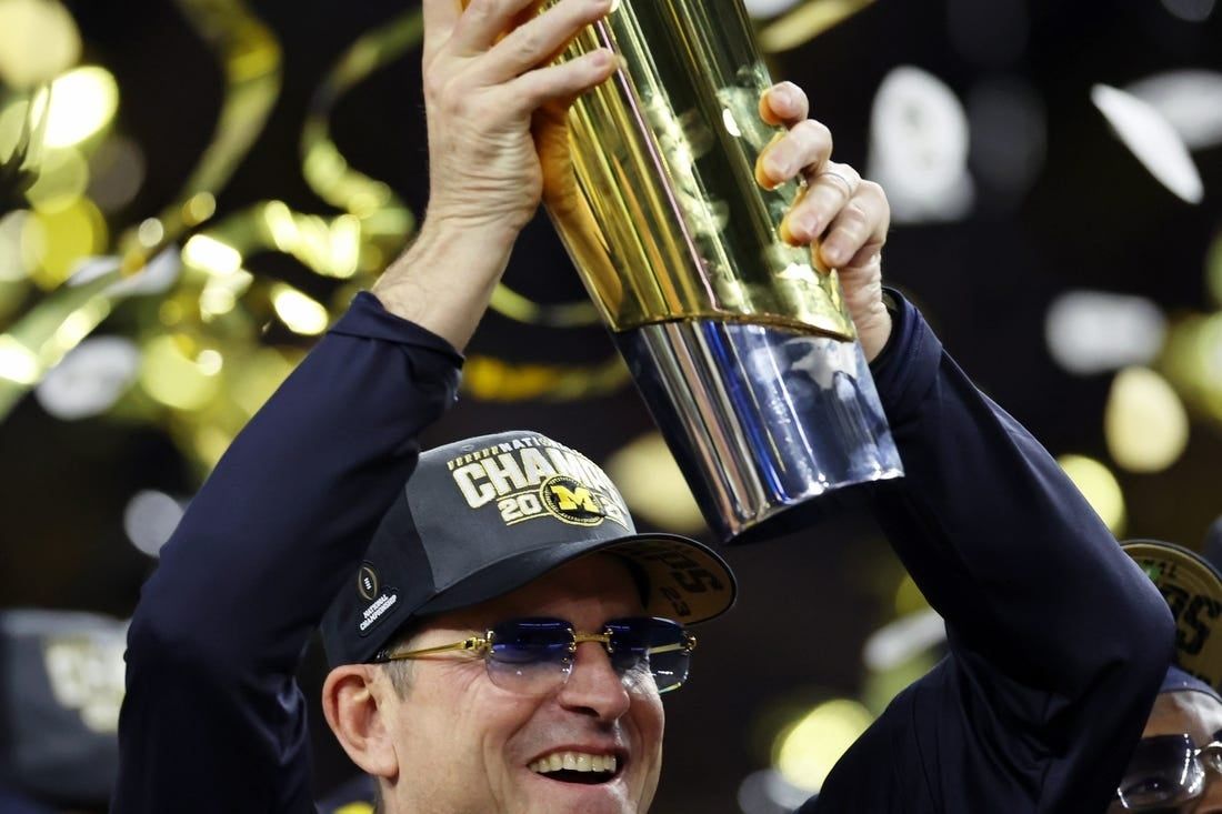Deadspin | Michigan, Jim Harbaugh wake up as champs: 'This wasn't a dream'