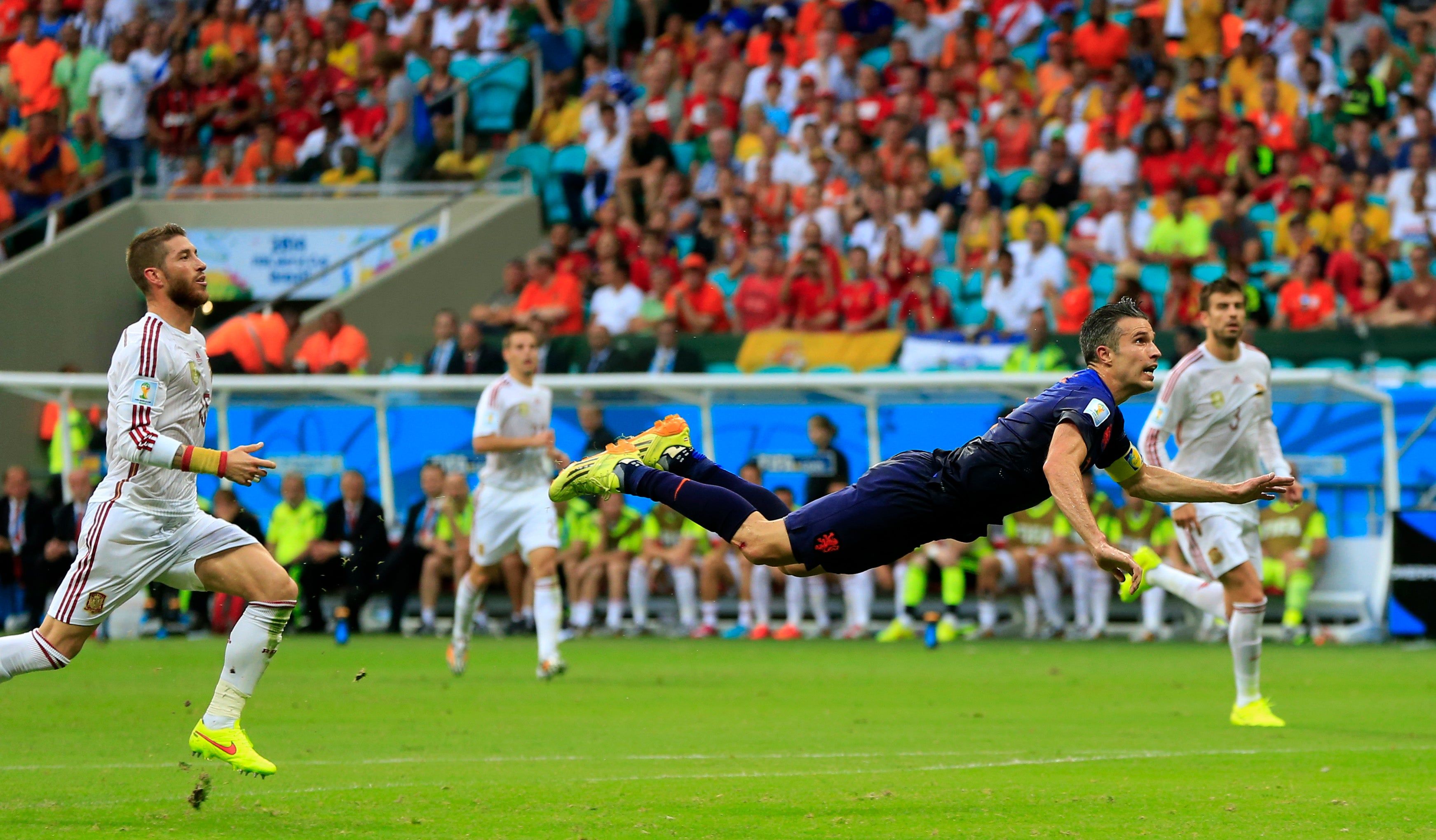 Deadspin | The Best Photos Of Robin Van Persie's Amazing Flying Header Goal