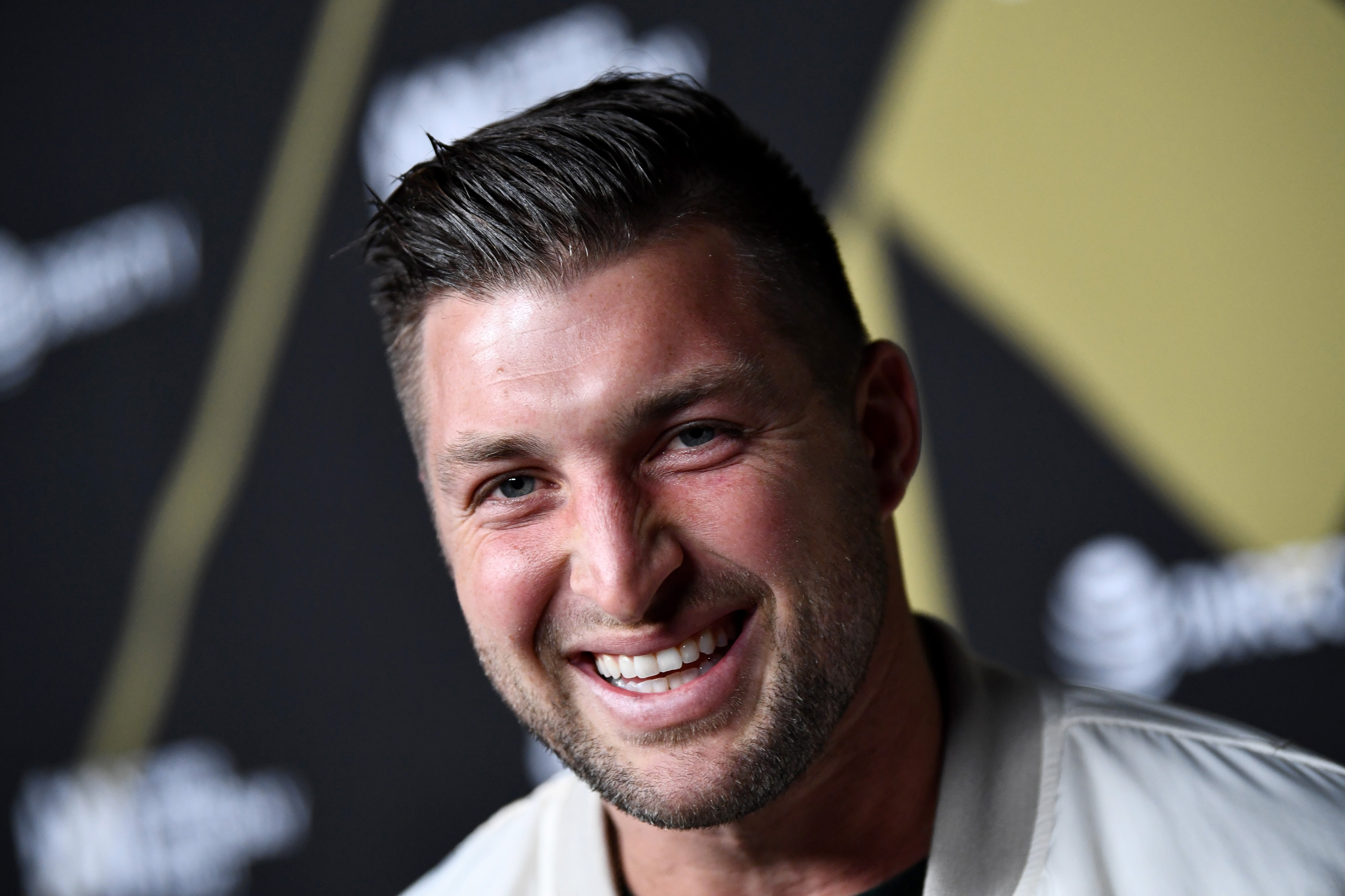 Deadspin | Tim Tebow And His Even Dirtier GQ Pictures